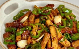 辣椒炒香干怎么做_香干炒辣椒先放哪个