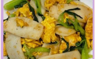 青菜炒年糕怎么炒不糊锅_青菜炒年糕家常做法