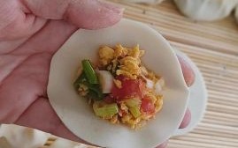 西红柿鸡蛋饺子馅怎么做不流汤_西红柿鸡蛋饺子馅怎么调好吃