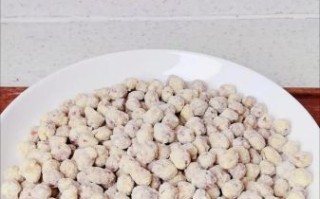 鸡蛋挂霜花生米怎么做_挂霜花生不返潮技巧