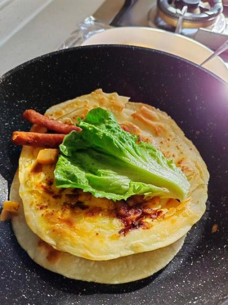 鸡蛋灌饼怎么做才蓬松_鸡蛋灌饼热量高吗-第3张图片-山城妙识