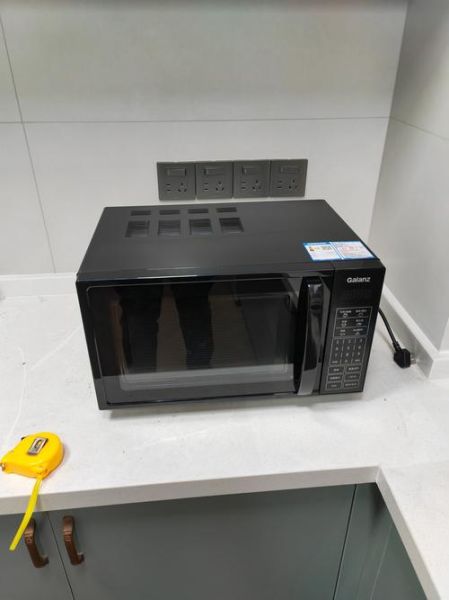 格兰仕和美的微波炉哪个好_家用微波炉选购指南-第1张图片-山城妙识