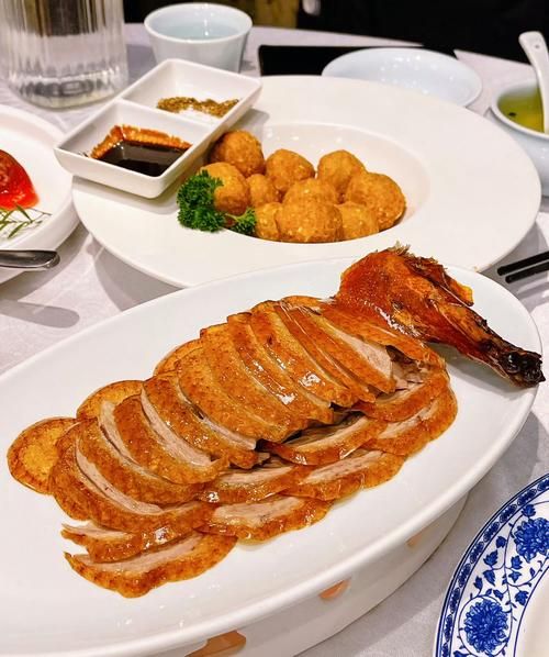 北京正宗烤鸭店哪家好_如何分辨挂炉与焖炉-第2张图片-山城妙识