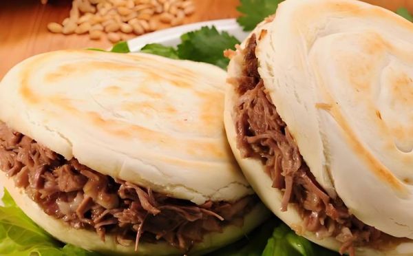 陕西肉夹馍哪里最正宗_肉夹馍和羊肉泡馍哪个更好吃-第3张图片-山城妙识