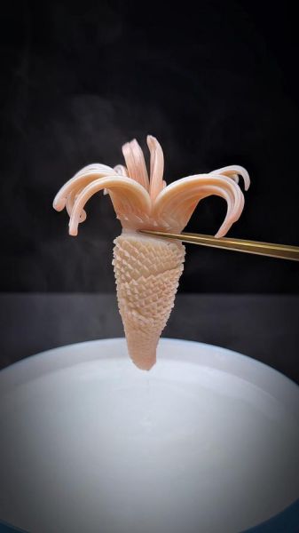 鱿鱼怎么切才会卷_切哪一边才卷-第1张图片-山城妙识