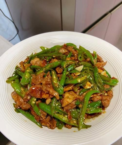 辣椒炒肉什么时候下锅_辣椒炒肉炒多久才嫩-第2张图片-山城妙识 辣椒炒肉什么时候下锅_辣椒炒肉炒多久才嫩-第2张图片-山城妙识