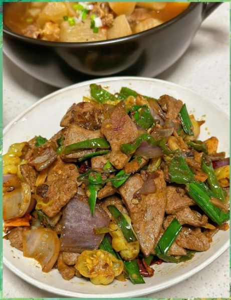 爆炒猪肝怎么做又嫩又好吃_猪肝嫩滑不腥的秘诀-第1张图片-山城妙识