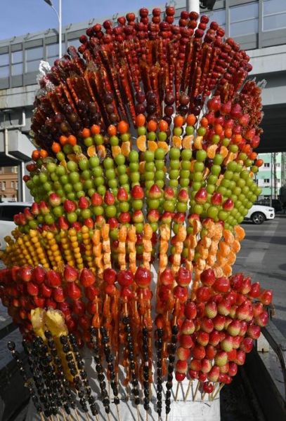 冰糖葫芦的寓意和象征_为什么过年吃它-第1张图片-山城妙识