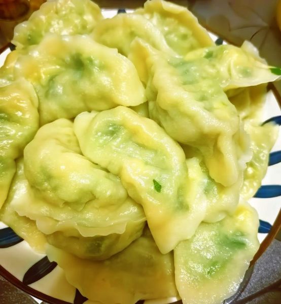 洋槐花鸡蛋饺子怎么做_洋槐花鸡蛋饺子馅怎么调-第1张图片-山城妙识