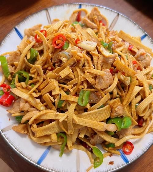 千张怎么炒好吃_千张的家常做法大全-第1张图片-山城妙识