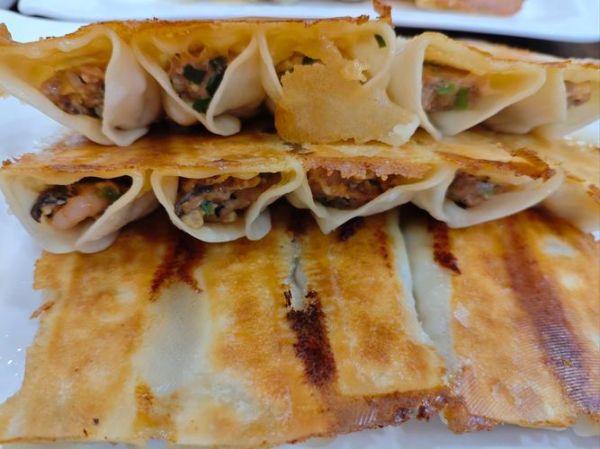 锅贴是哪里的传统小吃_锅贴起源于哪个城市-第1张图片-山城妙识