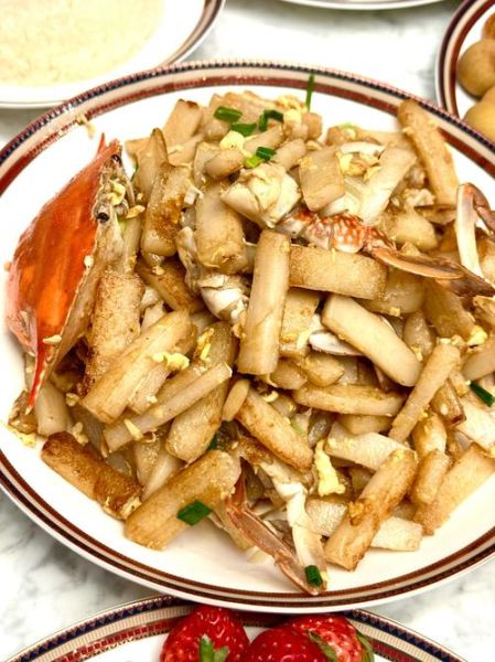 螃蟹炒年糕怎么做好吃_螃蟹炒年糕的窍门-第1张图片-山城妙识 螃蟹炒年糕怎么做好吃_螃蟹炒年糕的窍门-第1张图片-山城妙识