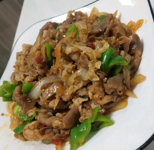 炒羊肉卷怎么做好吃_炒羊肉卷用哪个部位肉-第1张图片-山城妙识