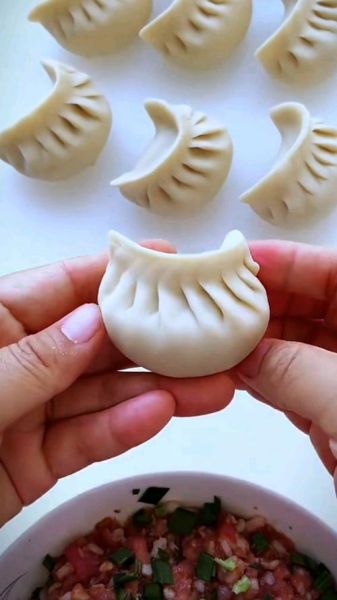 怎么包水饺不会露馅_水饺手法慢动作教学-第3张图片-山城妙识 怎么包水饺不会露馅_水饺手法慢动作教学-第3张图片-山城妙识