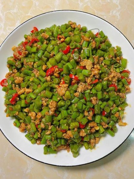 肉炒豆角怎么做才好吃_豆角炒肉要不要焯水-第1张图片-山城妙识 肉炒豆角怎么做才好吃_豆角炒肉要不要焯水-第1张图片-山城妙识